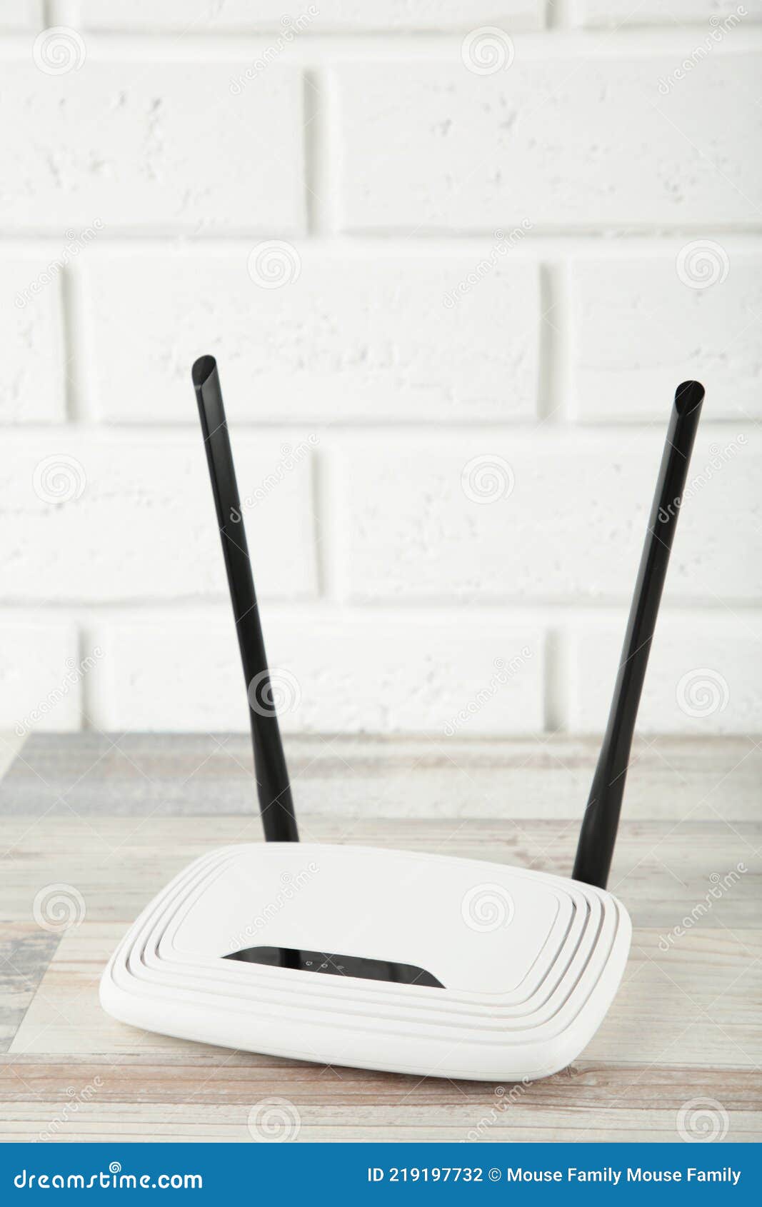 Wireless Wi-Fi Router on a White Background. Vertical Photo Stock Photo ...