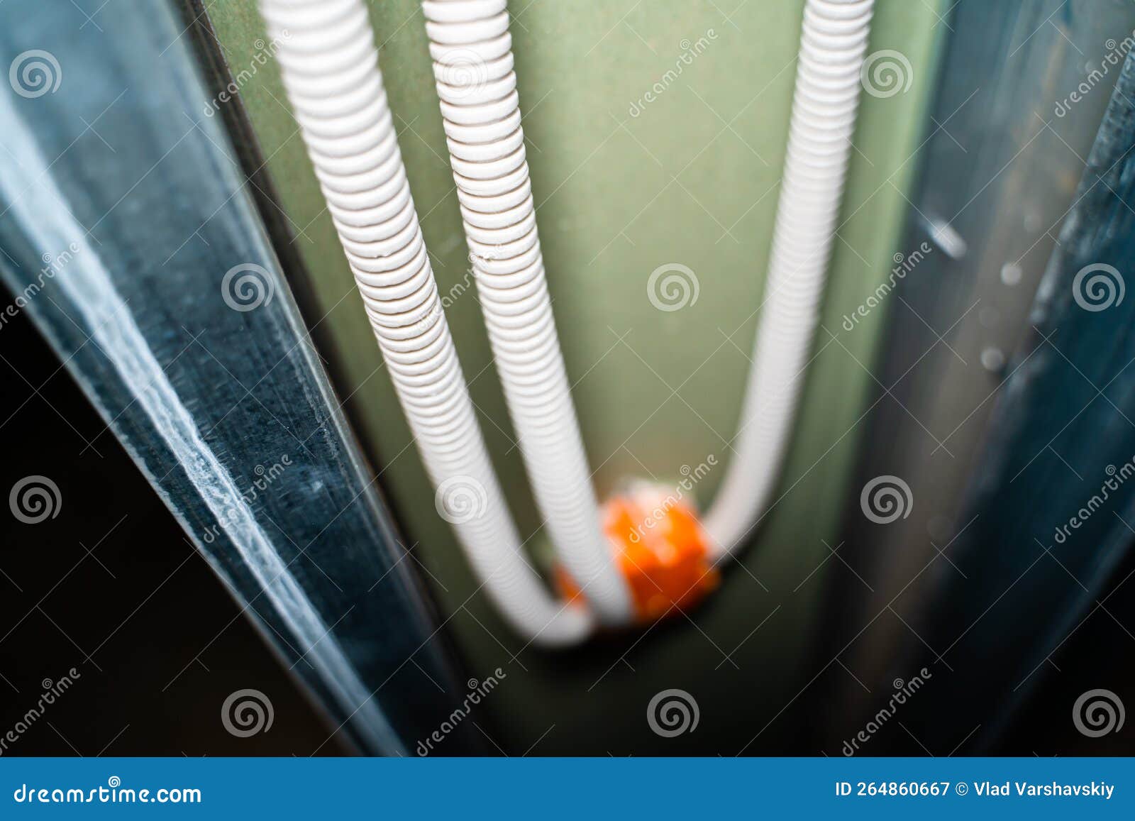 The Wires in the Protective Corrugated Pipe are Led Inside the Socket ...