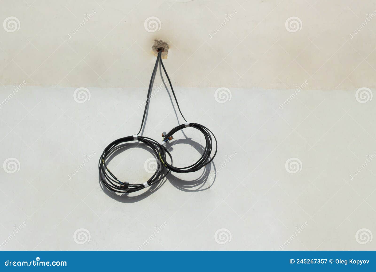 The Wires are in the Wall. Electrical Wires Stick Out of the Wall Stock ...