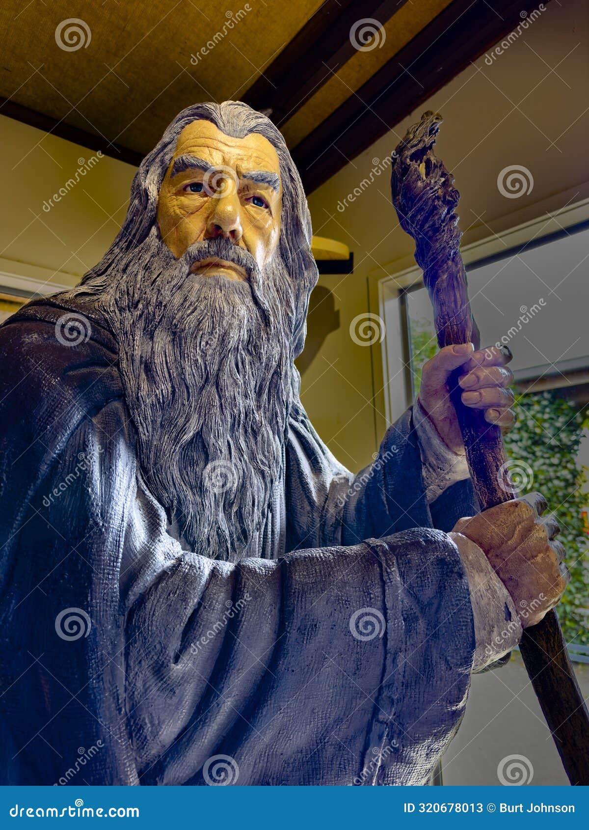 Wise Wizard Statue with Staff Editorial Stock Photo - Image of robe ...