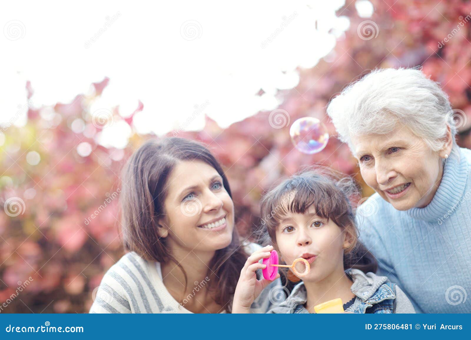 Wish upon a Bubble. a Three Generational Family Blowing Bubbles ...
