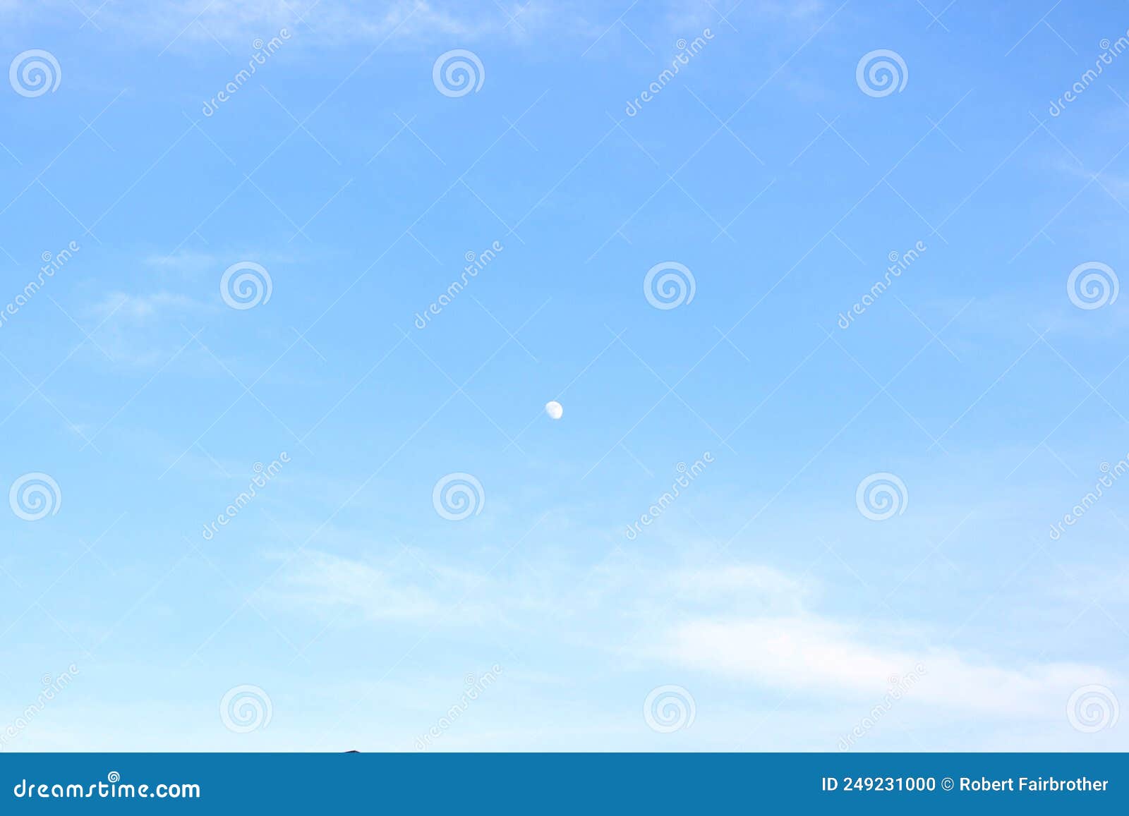 A Wisp of Clouds on Under a Bright Blue Sky Stock Photo - Image of blue ...