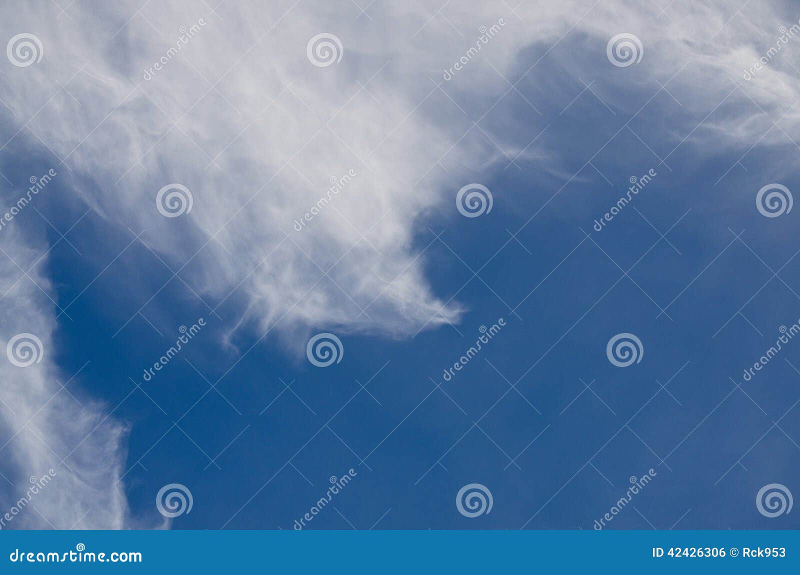 Wispy High Cirrus Clouds in a Blue Sky Stock Photo - Image of wispy ...