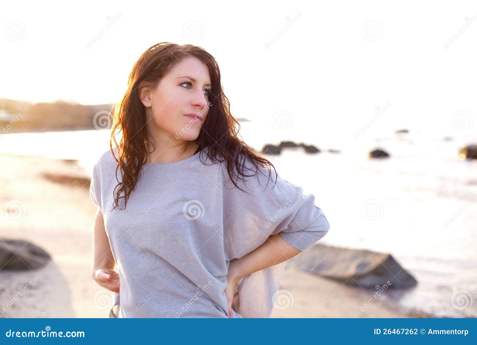 Wistful Woman on a Sunny Beach Stock Photo - Image of rocky, lifestyle ...