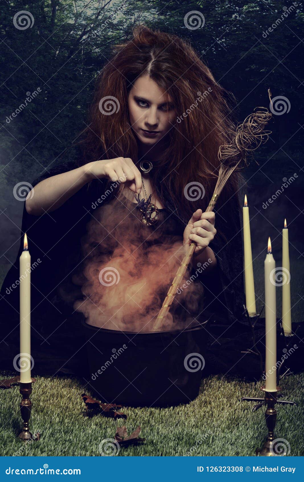 Witch Adding a Spider To Her Magic Potion Stock Photo - Image of book ...