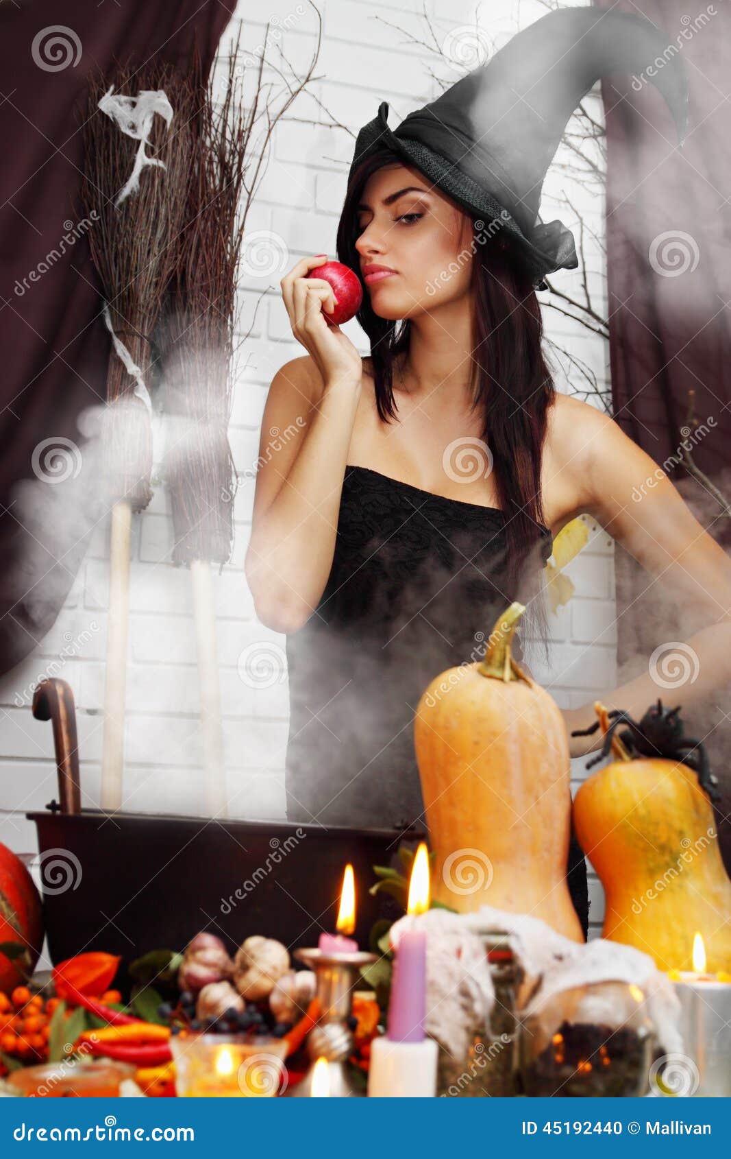 Witch with an apple stock photo. Image of blonde, indoors - 45192440
