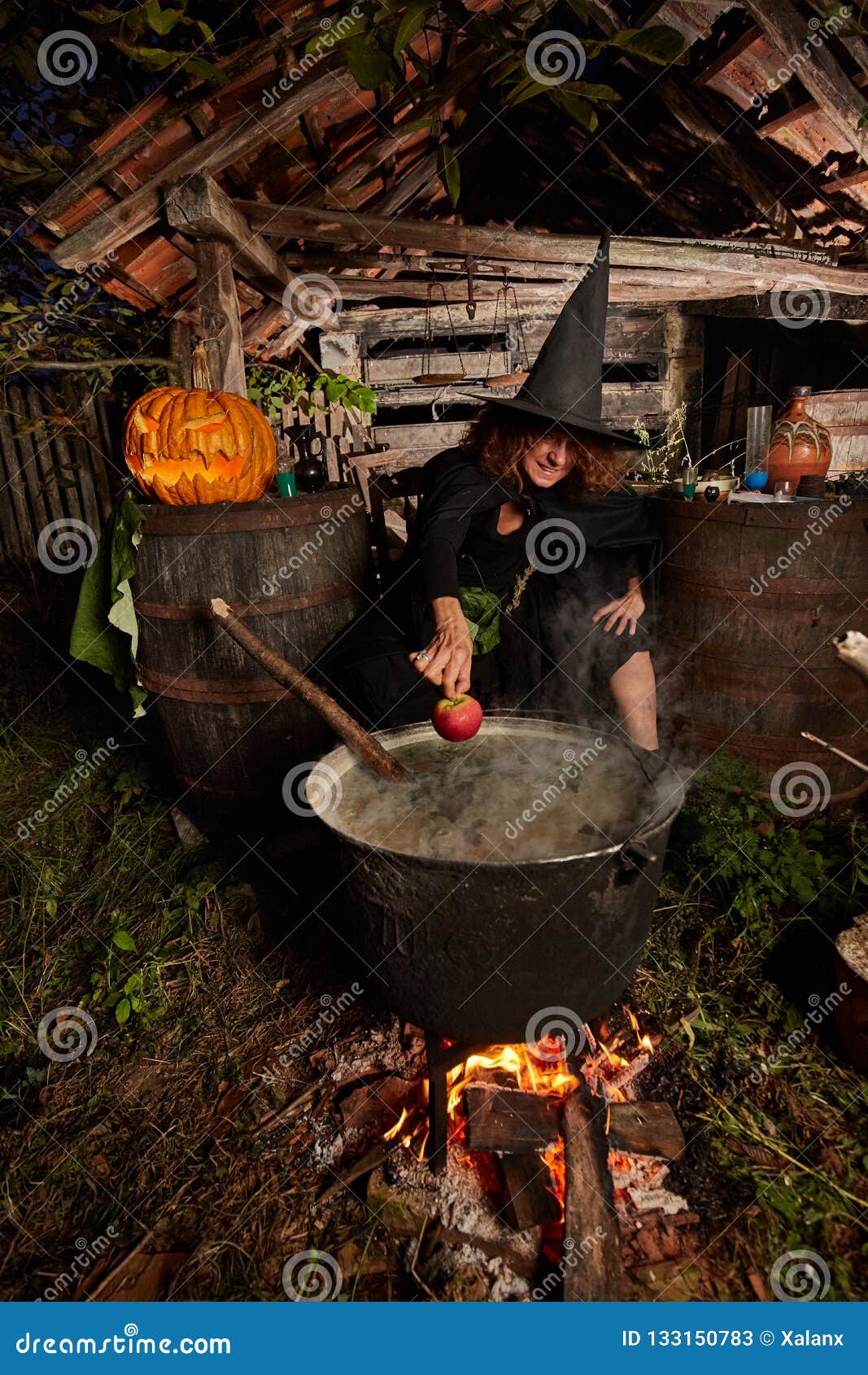 Witch boiling spells stock image. Image of figure, cloak - 133150783