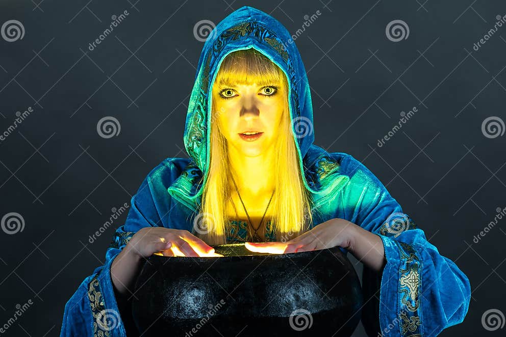 Witch with cauldron stock image. Image of cauldron, robed - 36693909