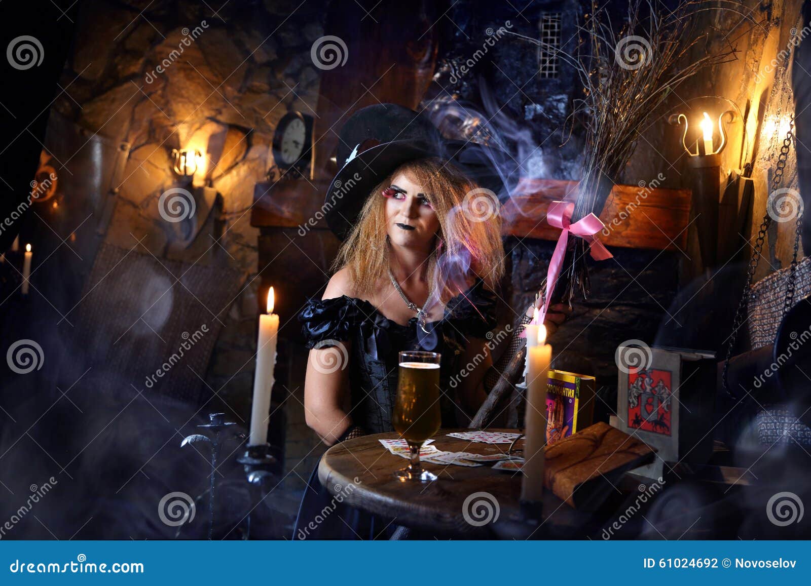 The Witch is Conjuring by the Candlelight. Stock Photo - Image of hair ...