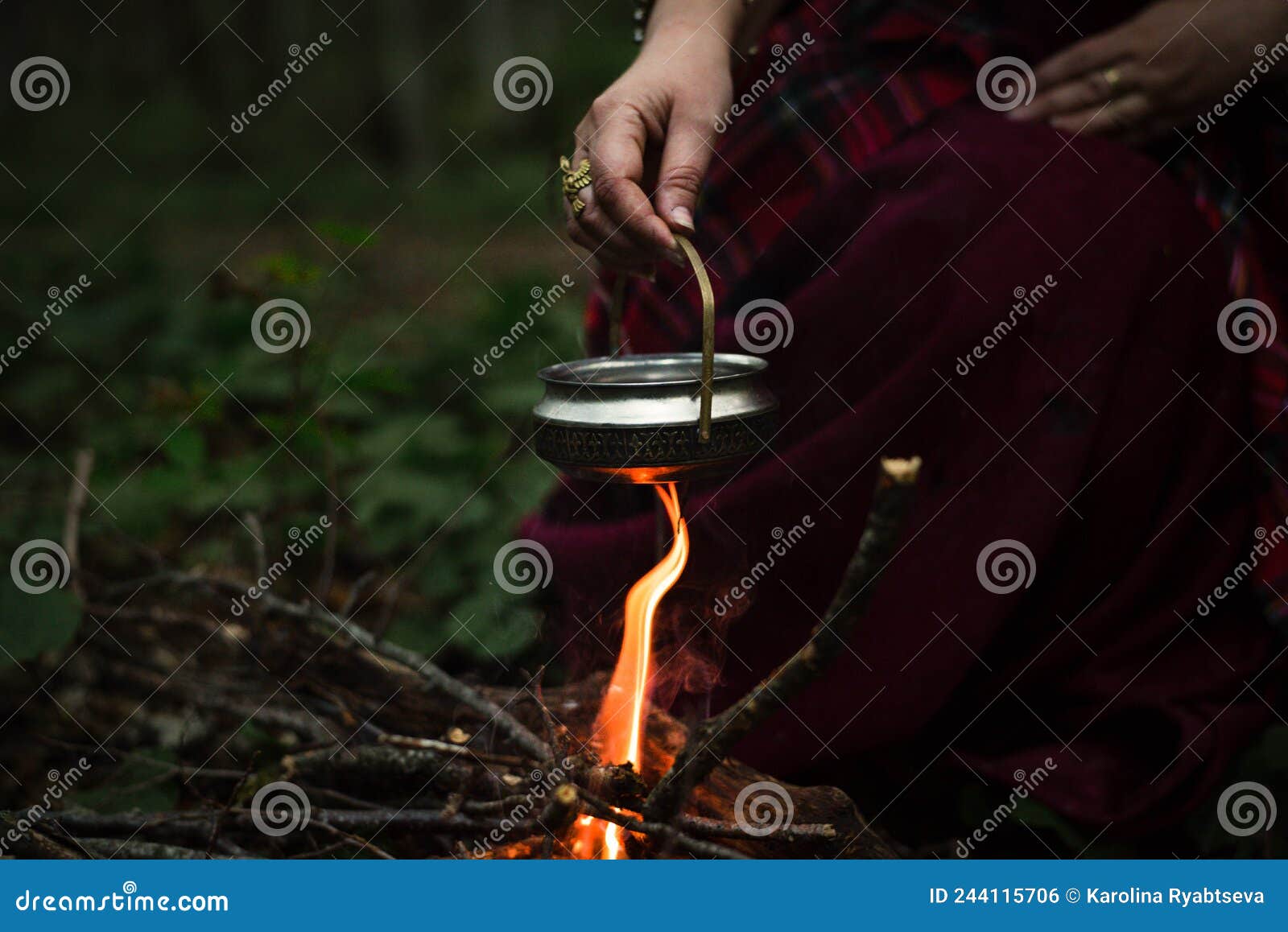 A Witch is Brewing a Magic Potion in the Forest Stock Photo - Image of ...