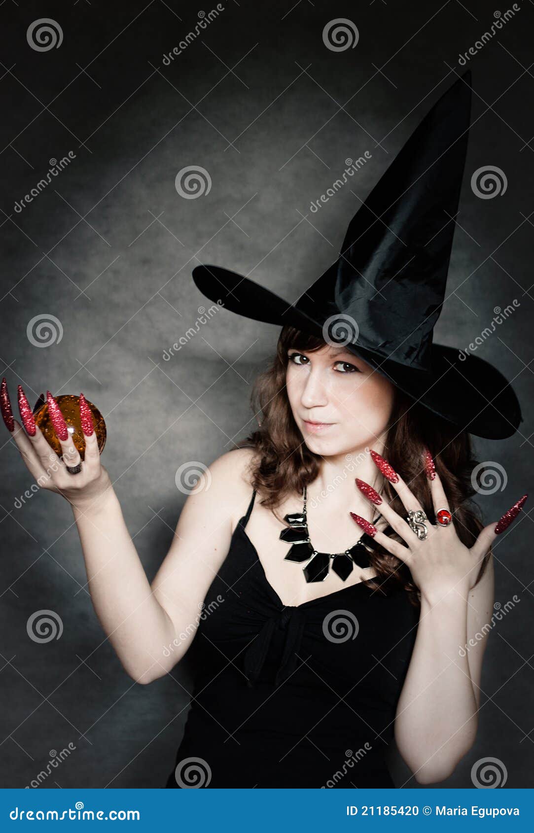 Witch with Crystal Ball in Hand Stock Photo - Image of beautiful ...