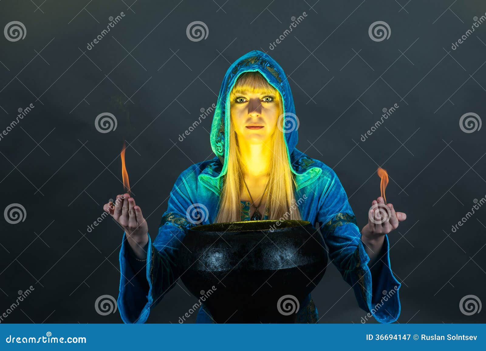 Witch with fire in hands stock image. Image of blond - 36694147