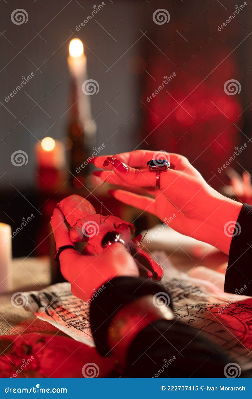 The Witch Holds a Voodoo Doll and Inserts a Needle into it. the Rite of ...