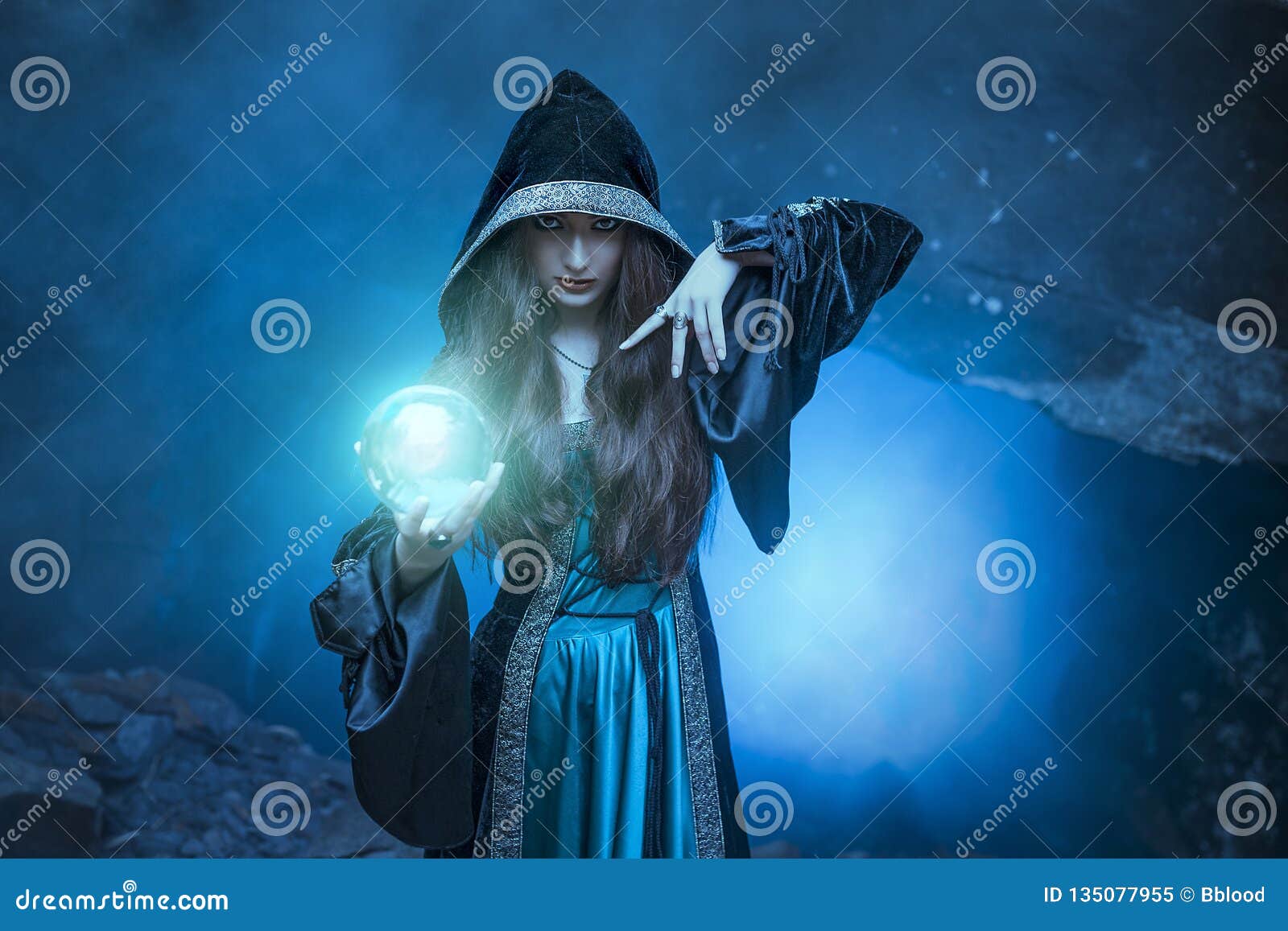 Magic. A Witch Conjuring A Magic Energy Ball With Her Hands. The ...