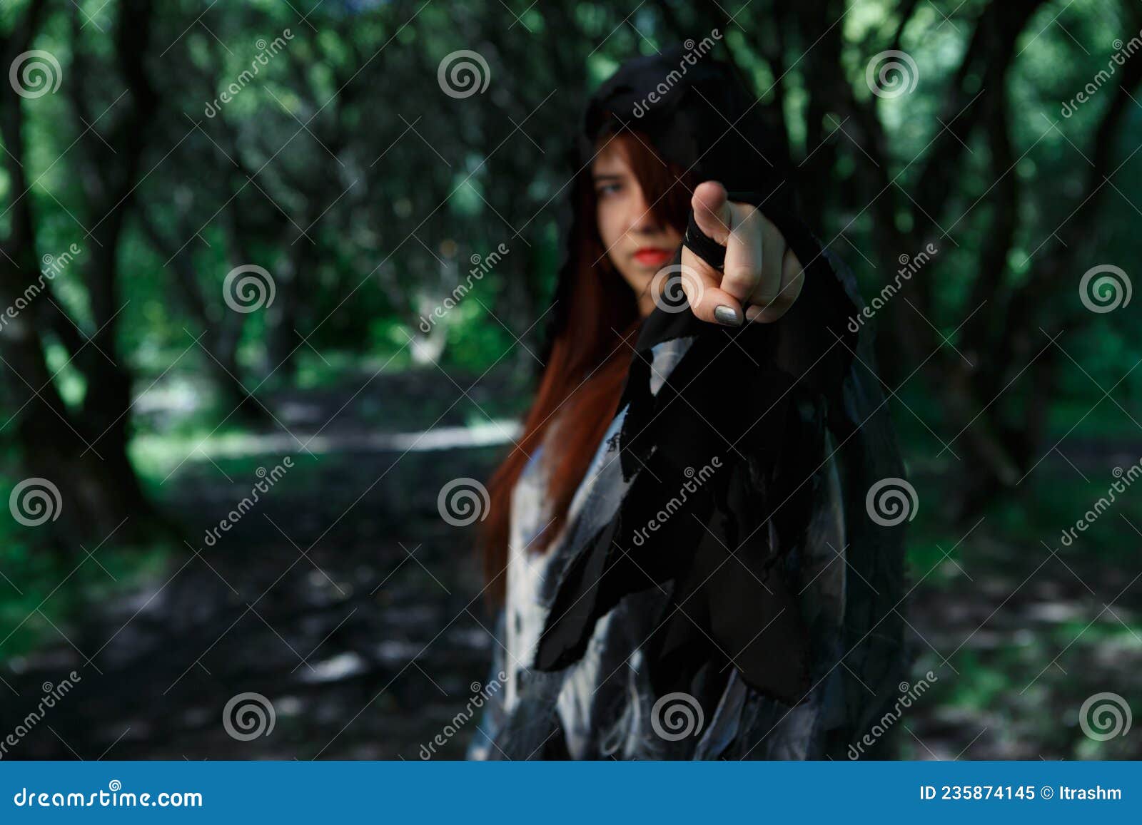 Witch Pointing Finger at Camera Stock Image - Image of defocused, dark ...