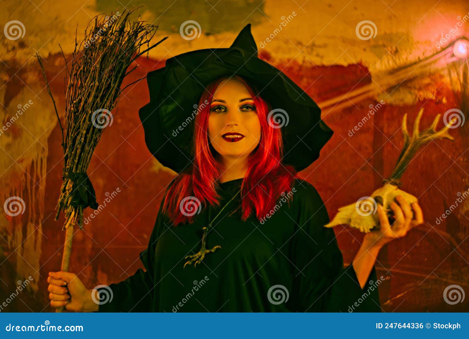 Witch in a Red-haired Hat. Halloween Concept. Stock Photo - Image of ...