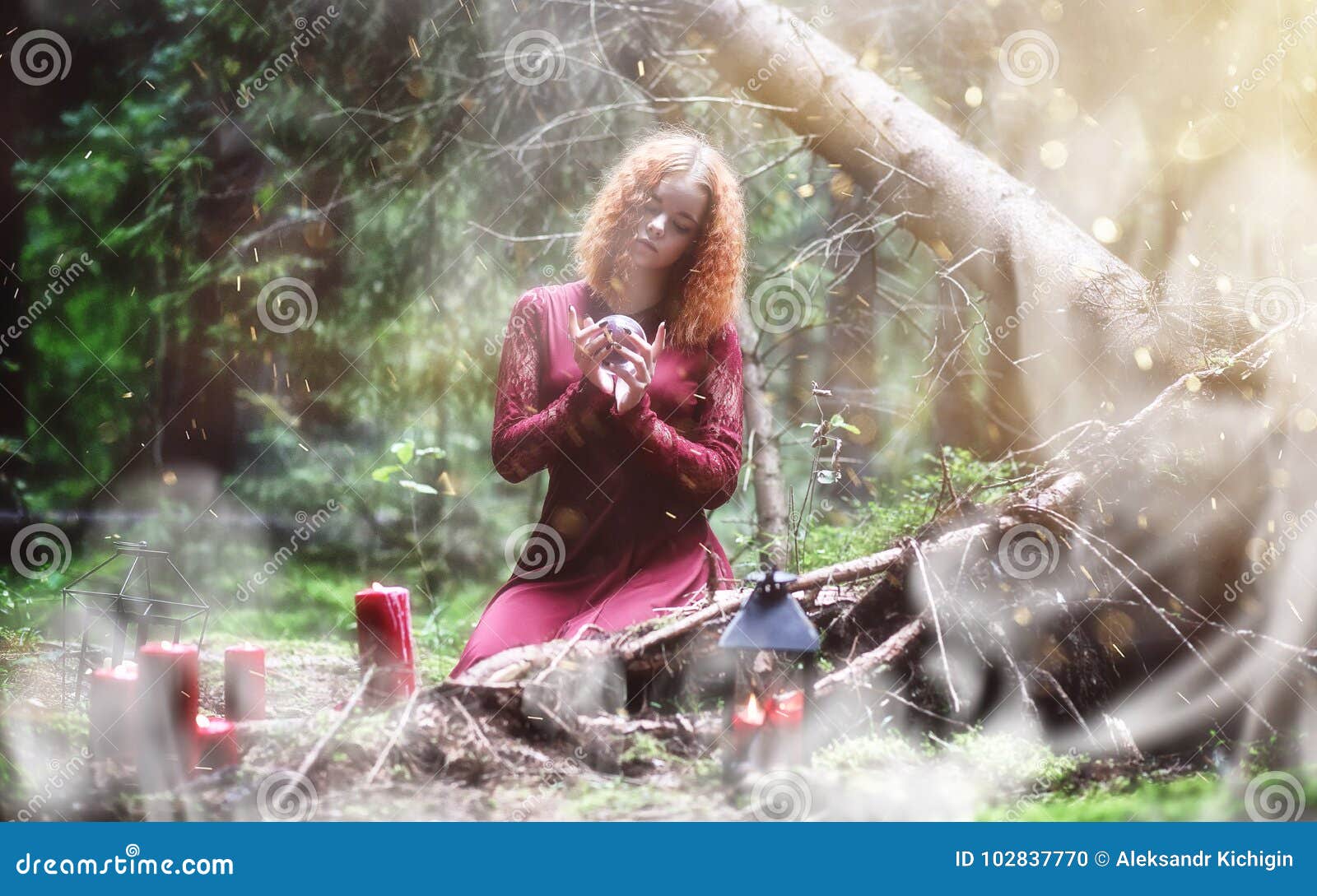 Witch ritual in a forest stock photo. Image of costume - 102837770