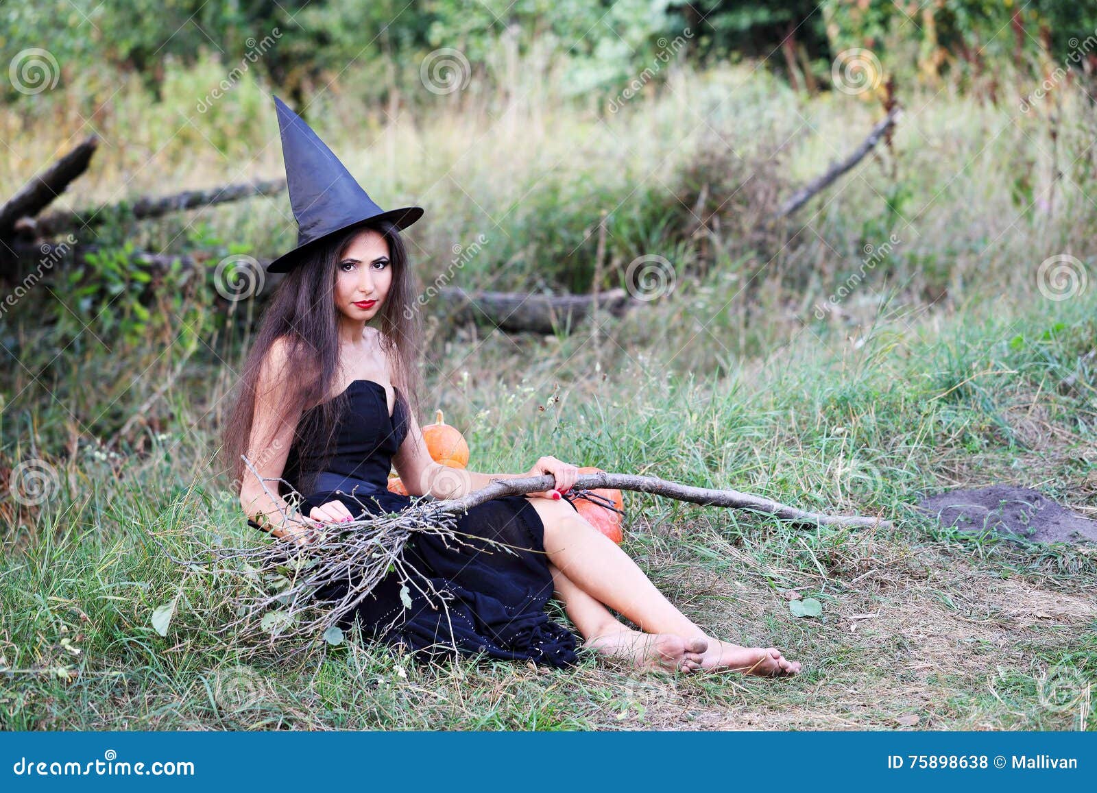 Witch sitting with a broom stock photo. Image of horror - 75898638