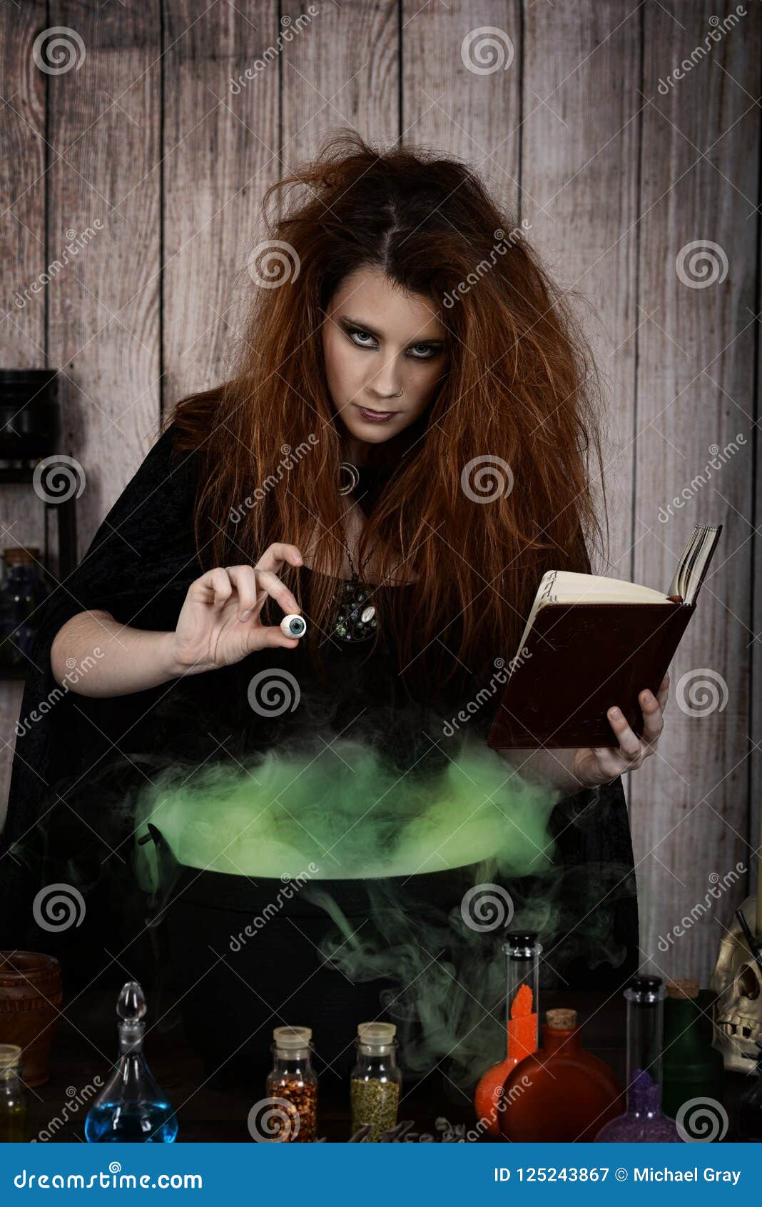 Witch with Spell Book and an Eye Stock Image - Image of lady, mystery ...