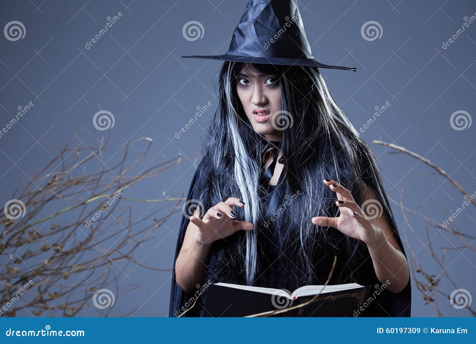 Witch using spell book stock image. Image of angry, wizard - 60197309