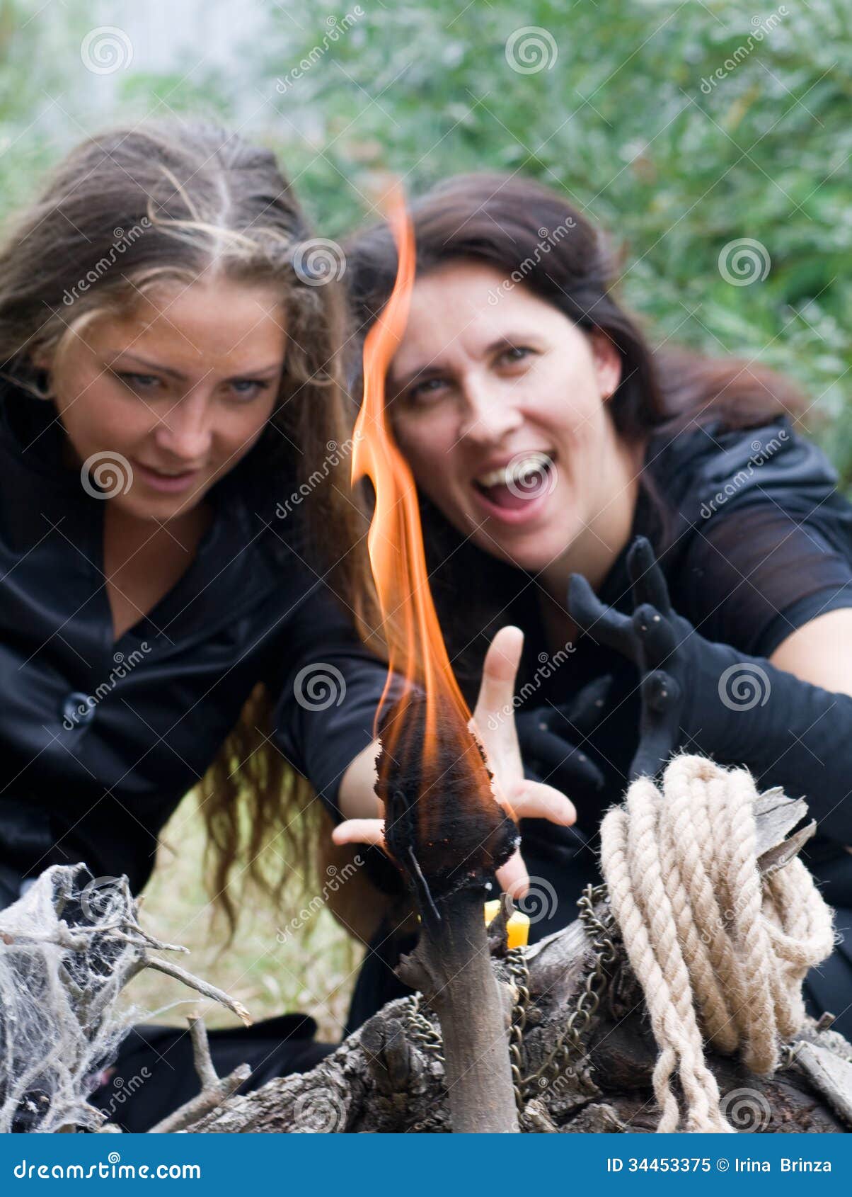 Witches conjure the fire stock image. Image of masquerade - 34453375