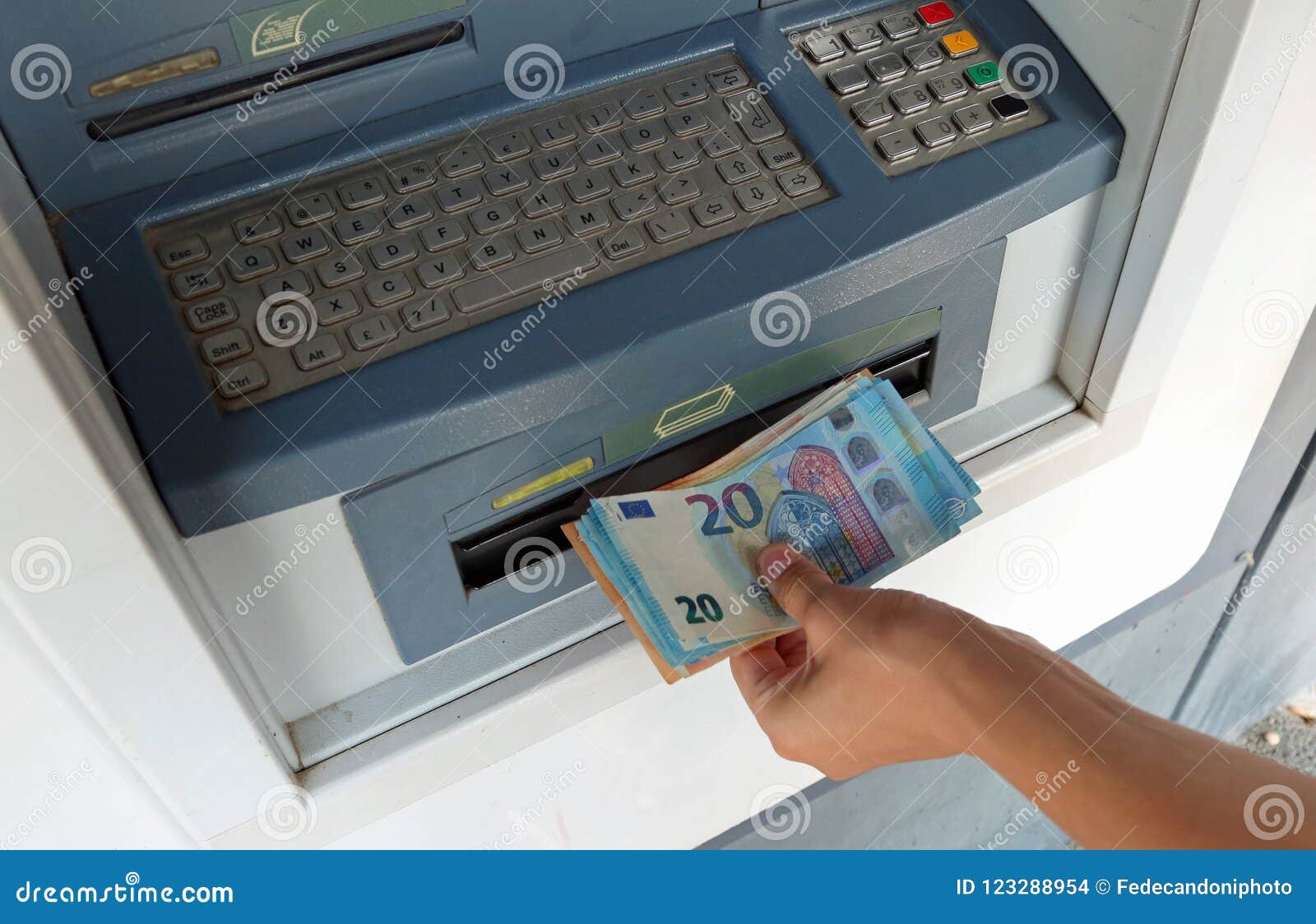 Withdrawal of European Banknotes from an Automatic ATM Machine Stock ...