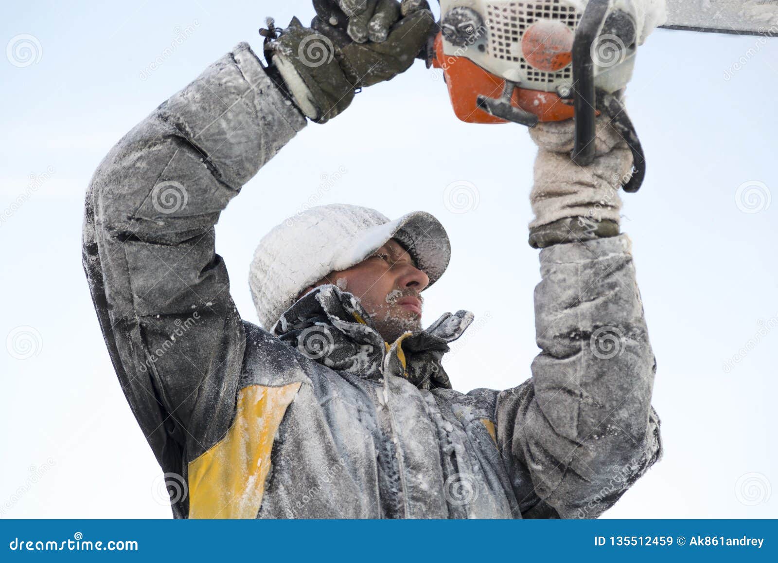 The Wizard Cuts Figures from the Ice Chainsaw Stock Image - Image of ...