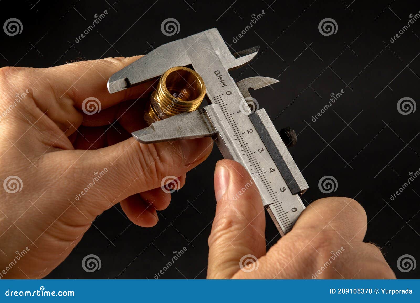 The Wizard Measures the Size of Brass Fitting Using a Caliper before ...