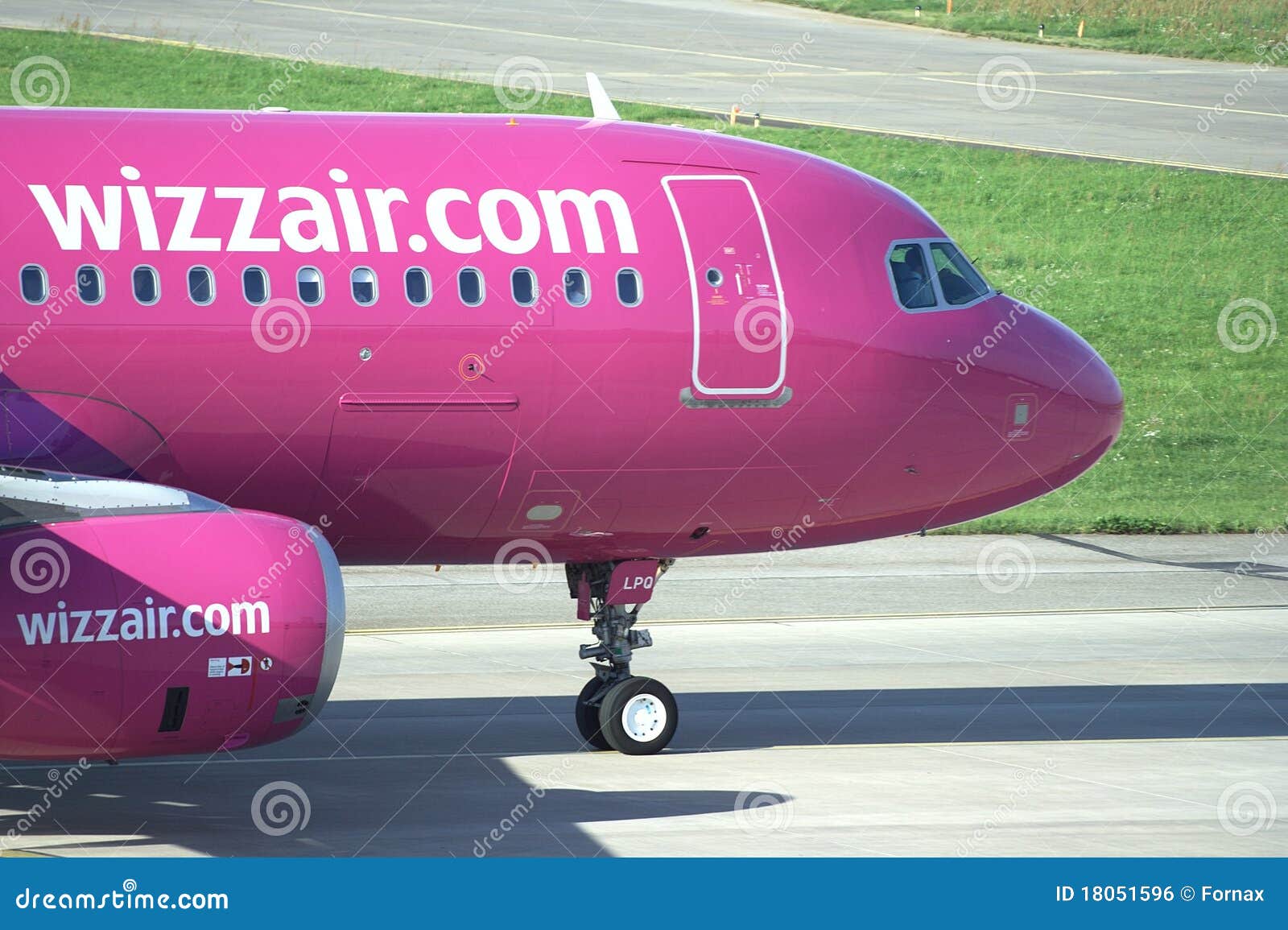 Wizzair Airliner Landing Editorial Photo | CartoonDealer.com #129490597