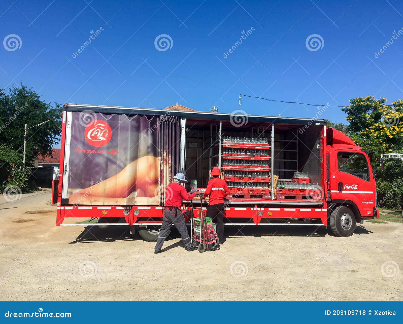 Wo Coca Cola Workers are Offloading the Drinking Bottles Editorial ...