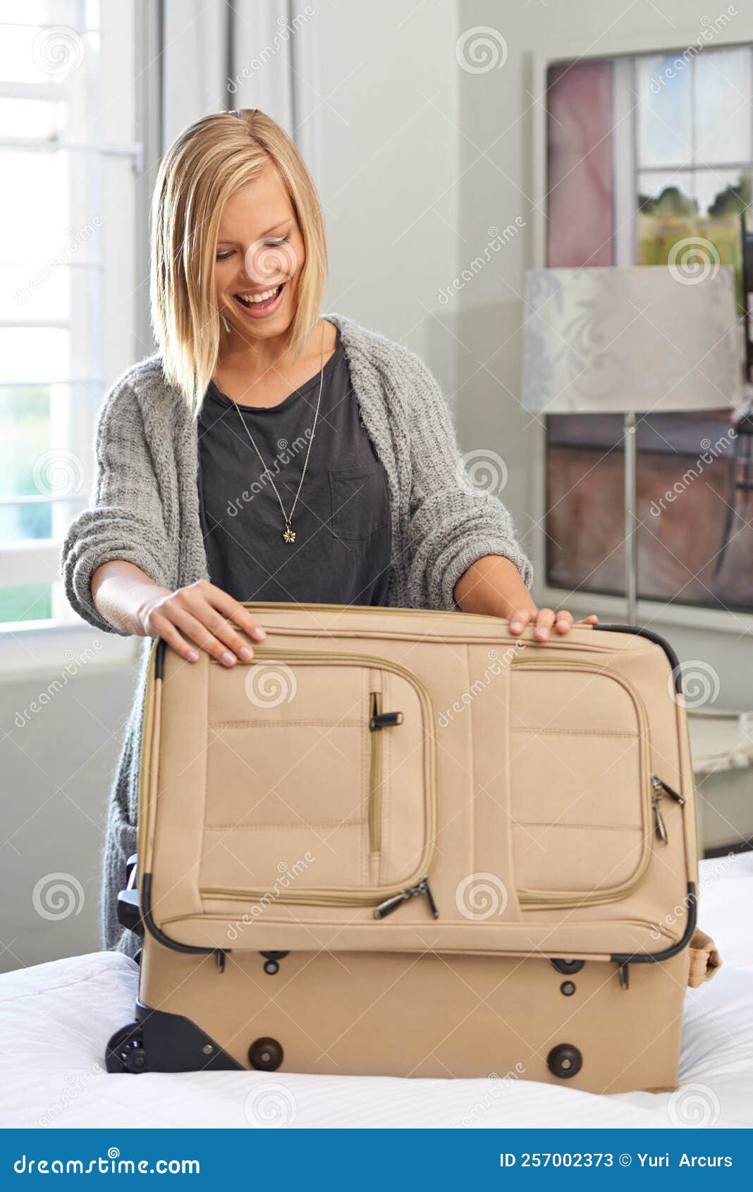 Woah, Everything Fits. a Young Woman Packing Her Suitcase. Stock Image ...