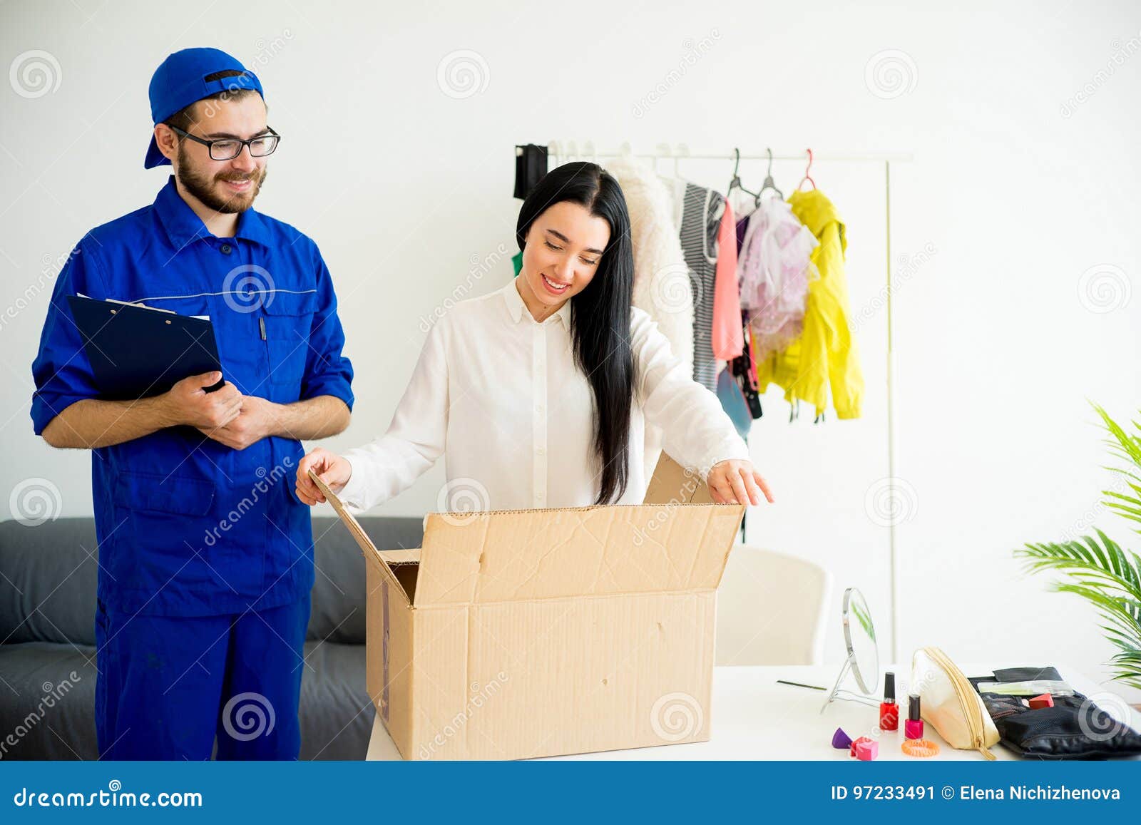 Woman accepting a delivery stock image. Image of post - 97233491
