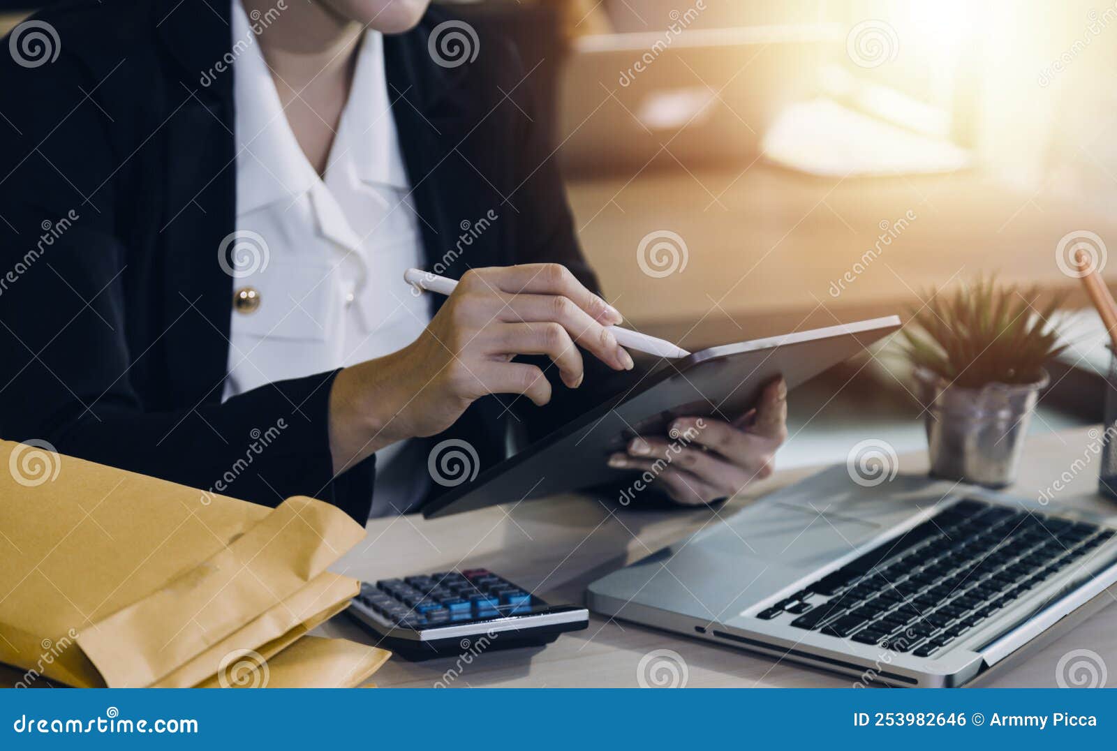 Woman Accountant Use Calculator and Computer with Holding Pen on Stock ...