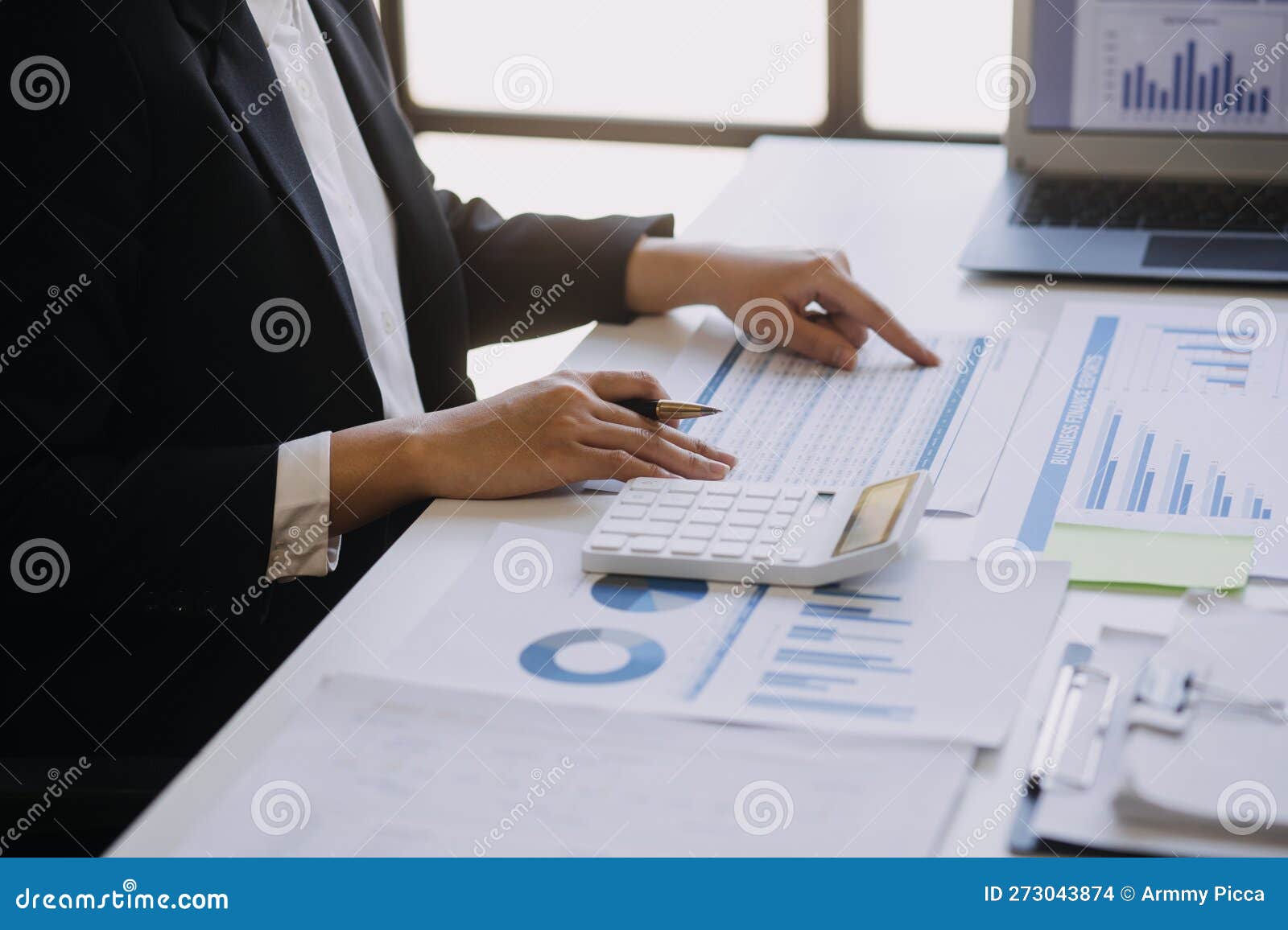 Woman Accountant Use Calculator and Computer with Holding Pen on Stock ...