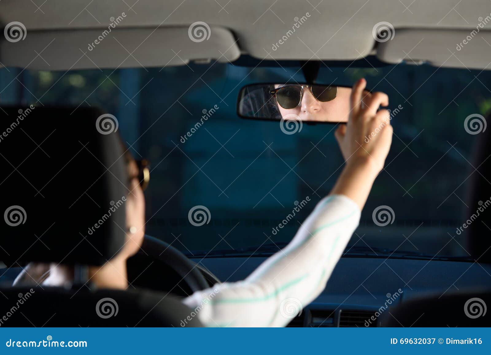 Adjusting Rear View Mirror; Focus On Hand, Silhouette Stock Image ...