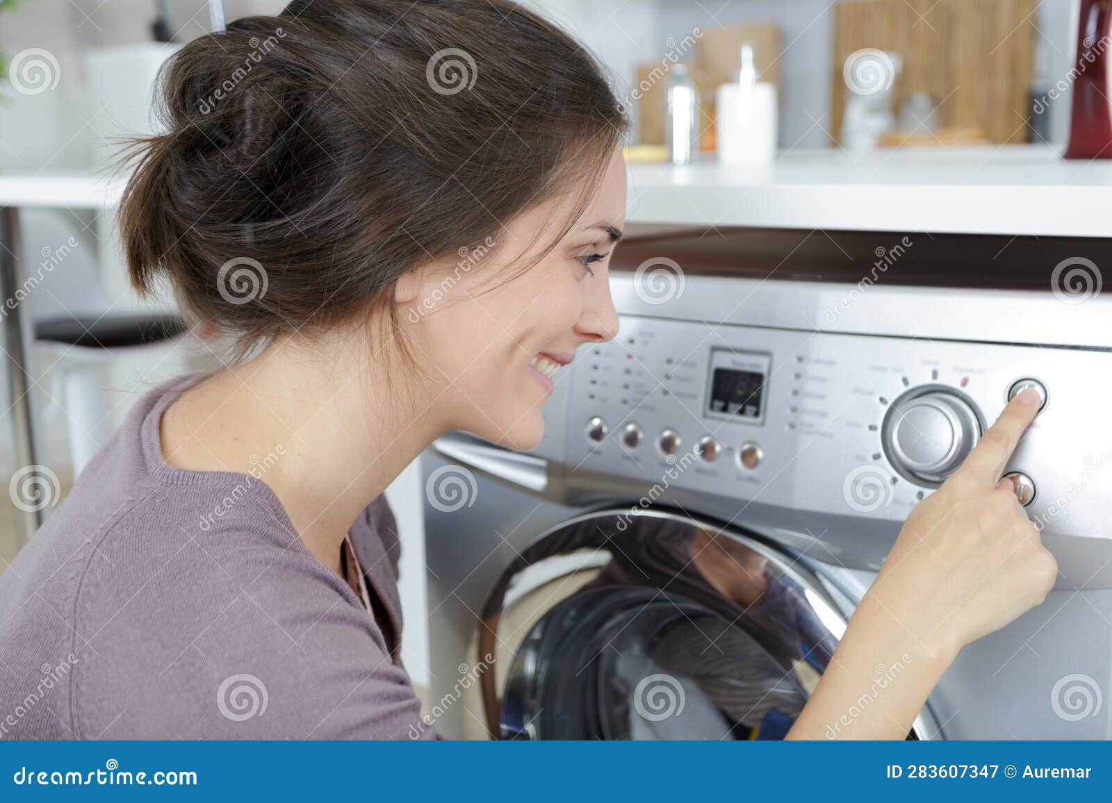 Woman Adjusting Washing Machine Stock Image - Image of electric ...