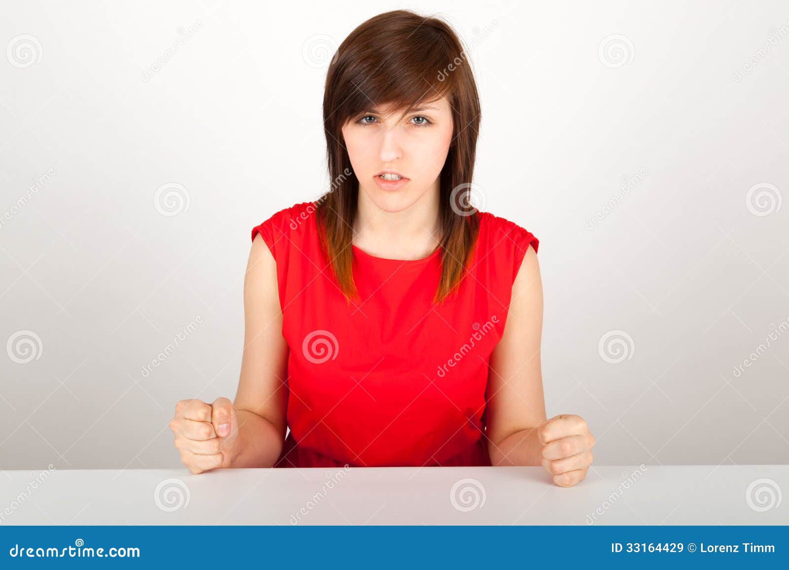 The Woman is Angrily Sitting at the Table Stock Image - Image of young ...