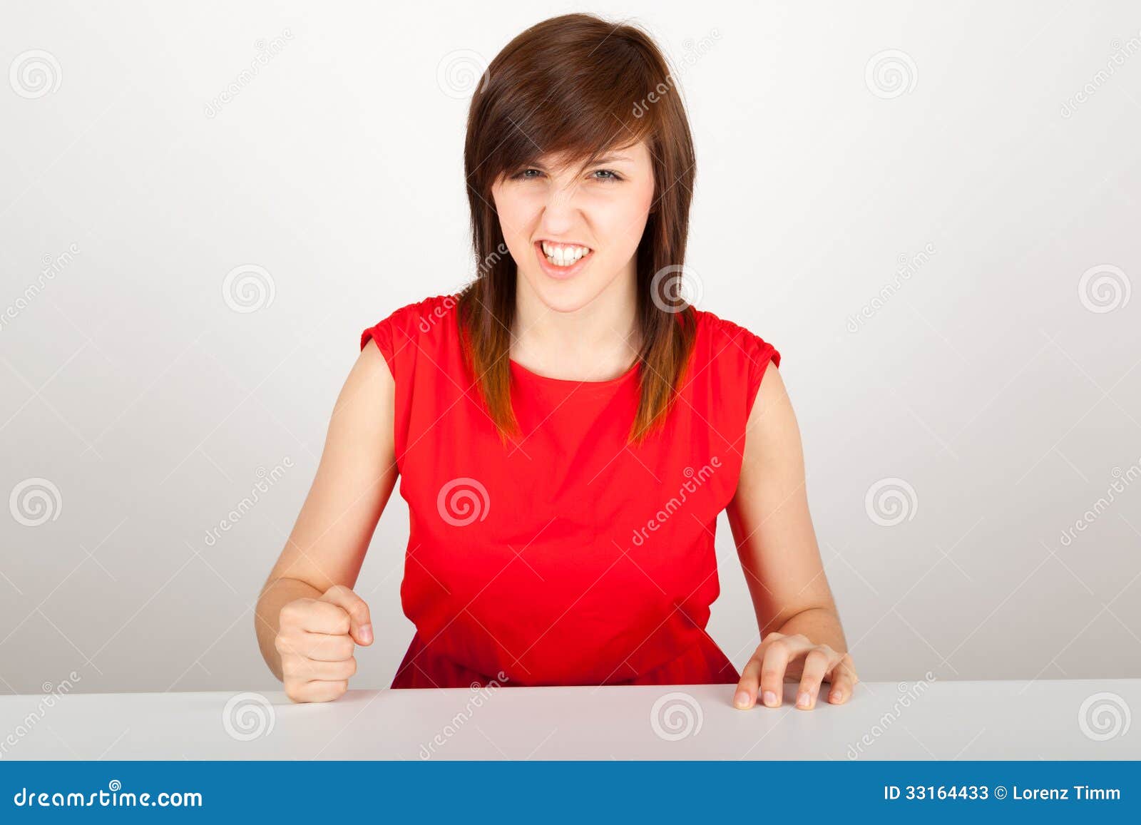 The Woman is Angrily Sitting at the Table Stock Image - Image of ...