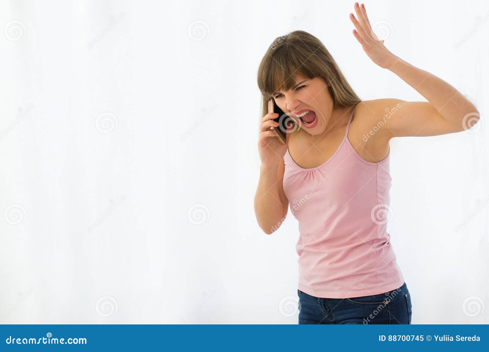 Woman Angrily Talking on Phone Stock Image - Image of white, call: 88700745