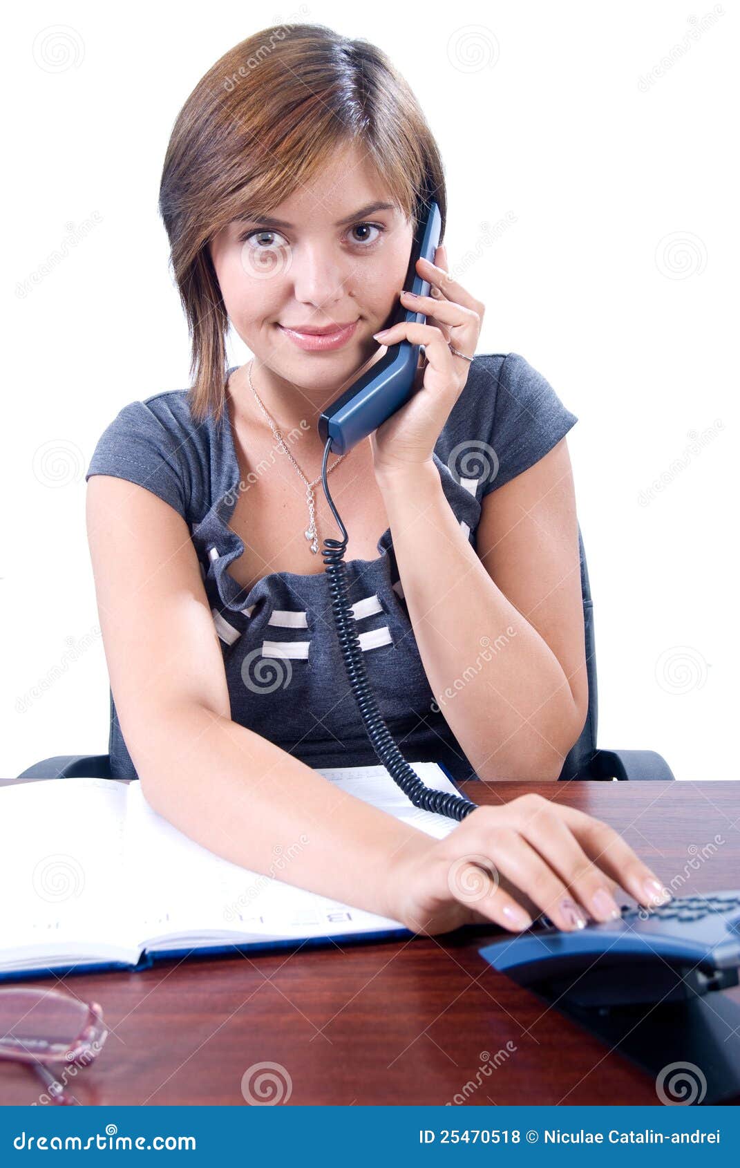 Woman answers the phone stock photo. Image of office - 25470518