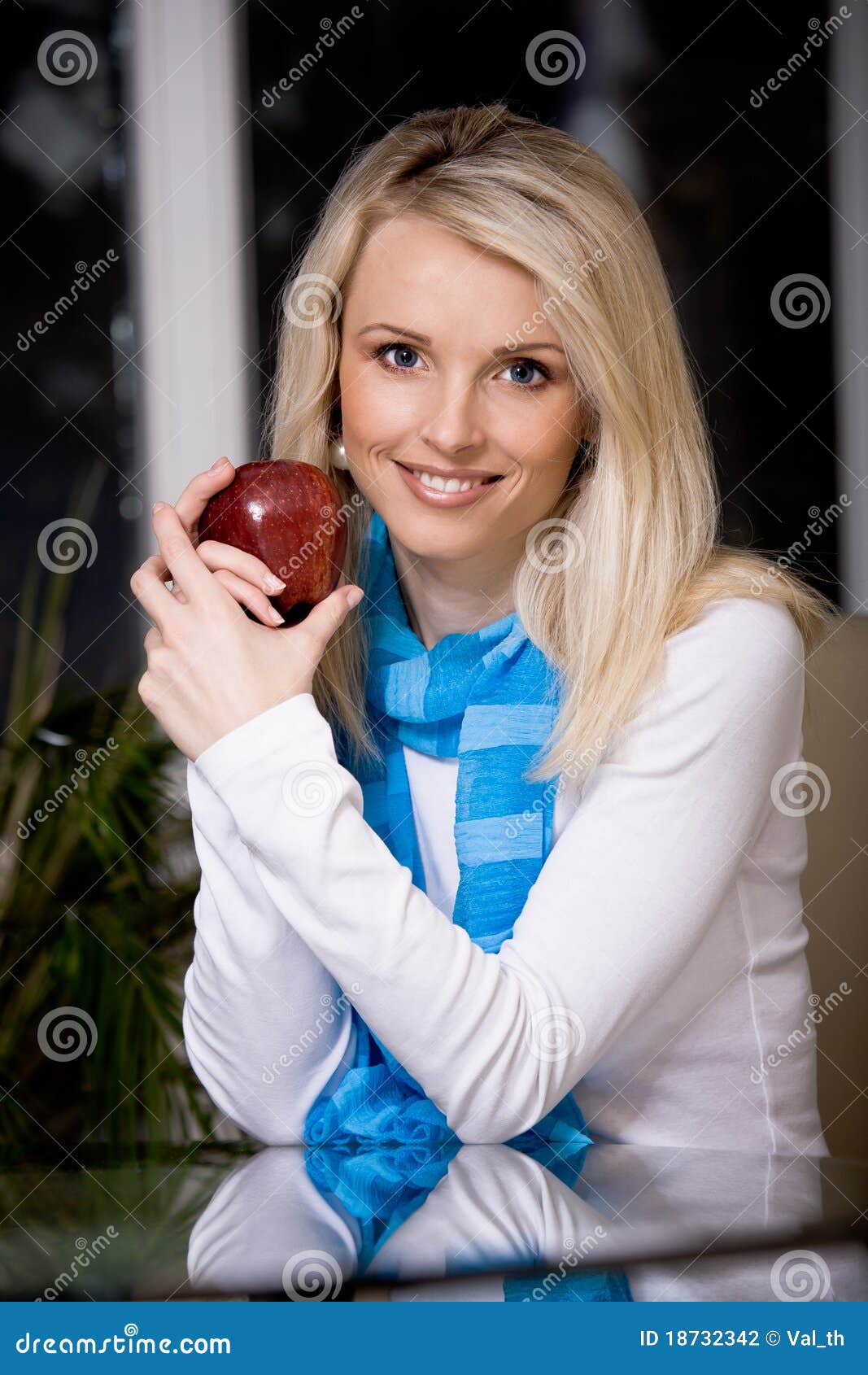 Woman with an apple stock photo. Image of female, apple - 18732342