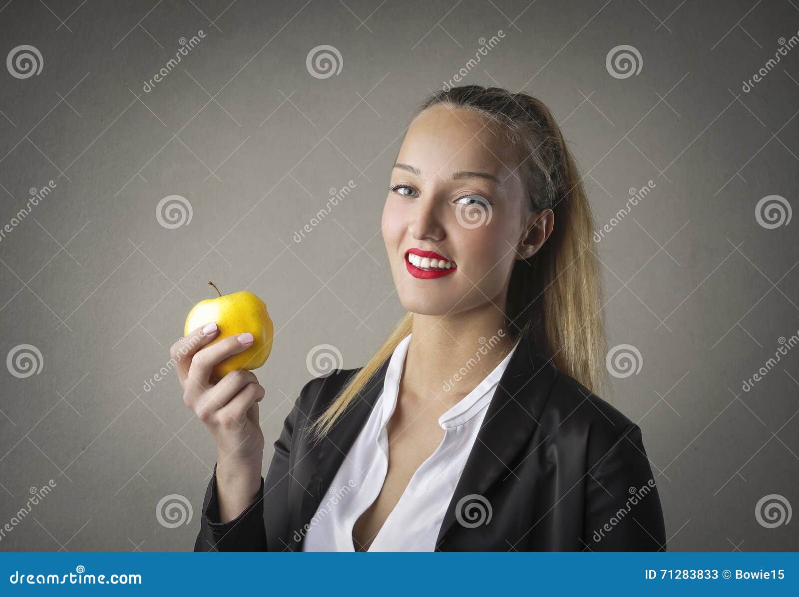 Woman with apple stock image. Image of office, fruit - 71283833