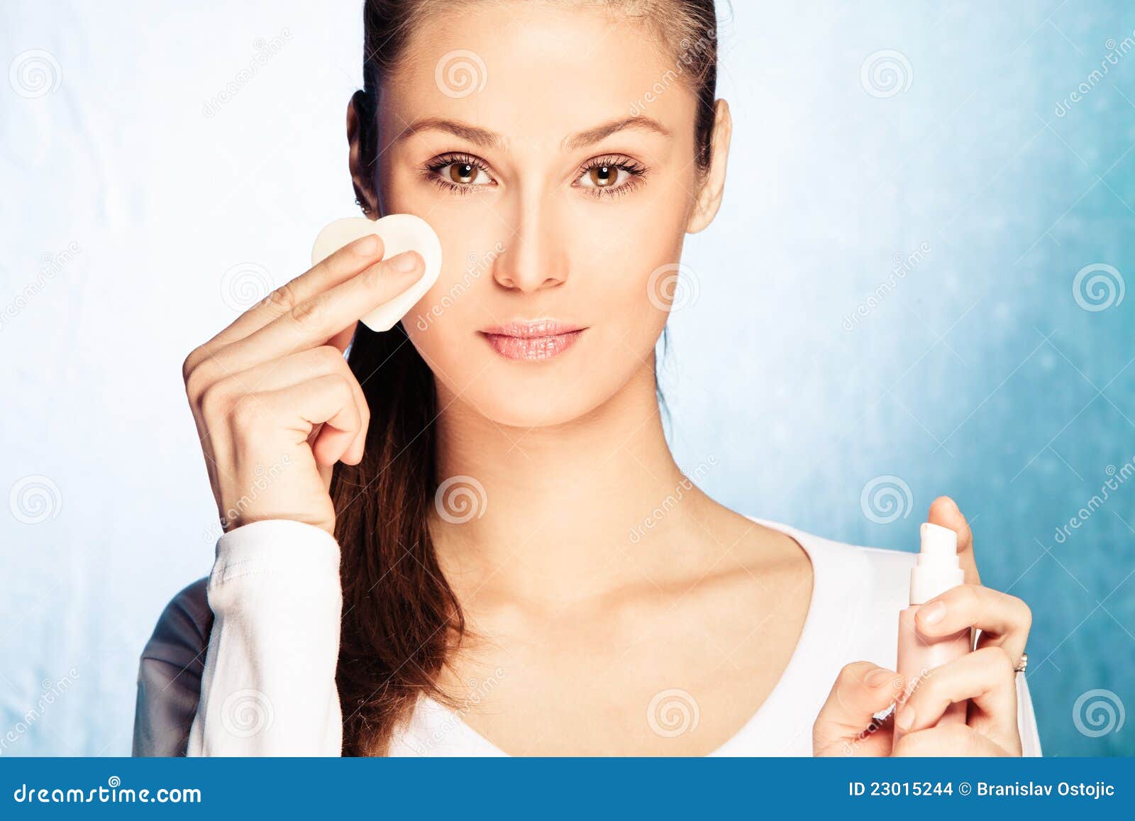 Woman apply foundation stock photo. Image of cosmetology - 23015244