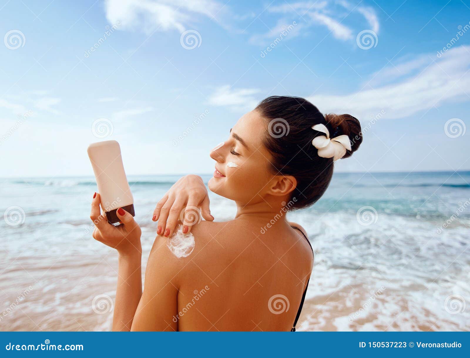Woman Apply Sun Cream On Tanned Back Skin And Body Care Sun