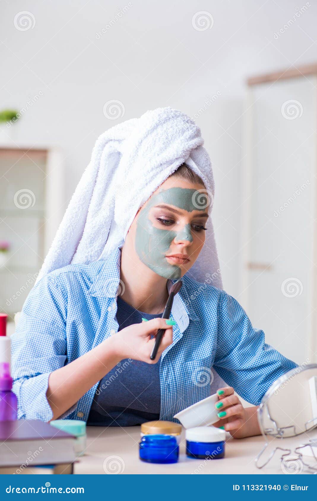 The Woman Applying Clay Mask with Brush at Home Stock Photo - Image of ...