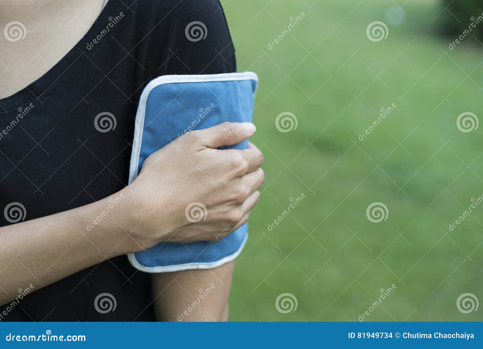 Woman Applying Cold Pack on Her Arm Stock Photo - Image of muscular ...