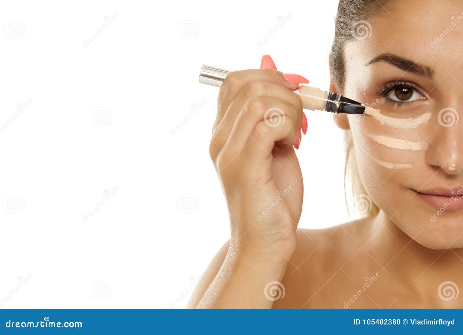Woman applying concealer stock photo. Image of concealer - 105402380