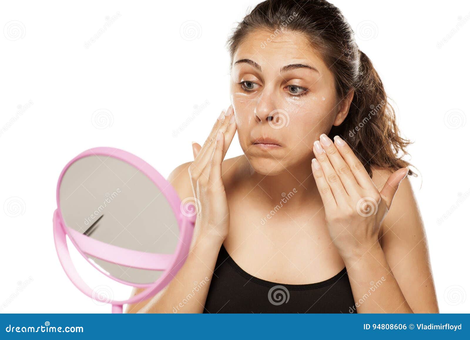 Woman applying cosmetics stock photo. Image of lifestyle - 94808606