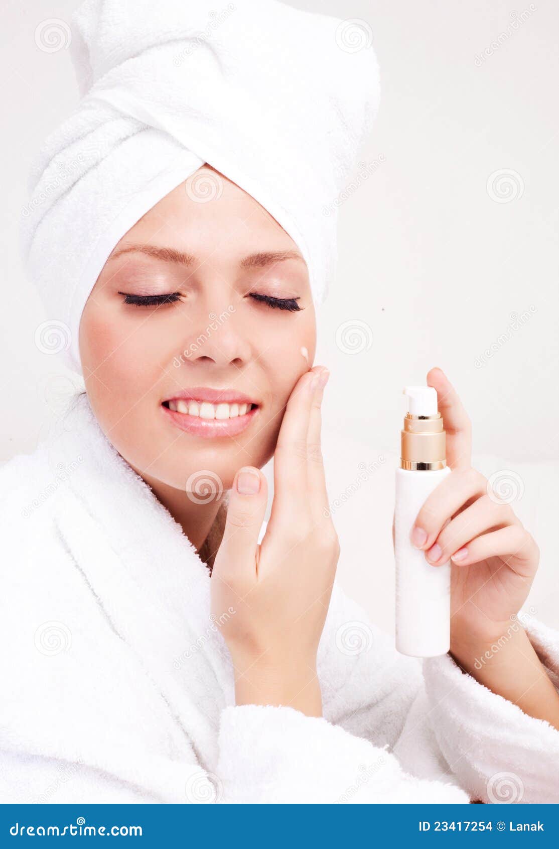 Woman applying cream stock photo. Image of body, cheerful - 23417254