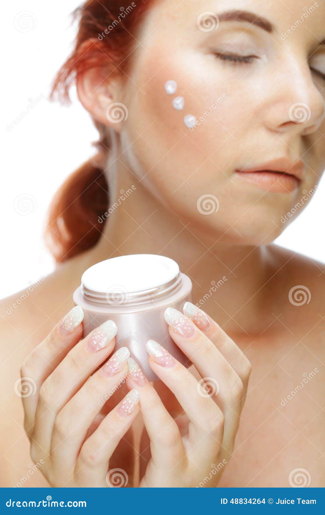 Woman Applying Cream on Her Face Stock Photo - Image of applying ...